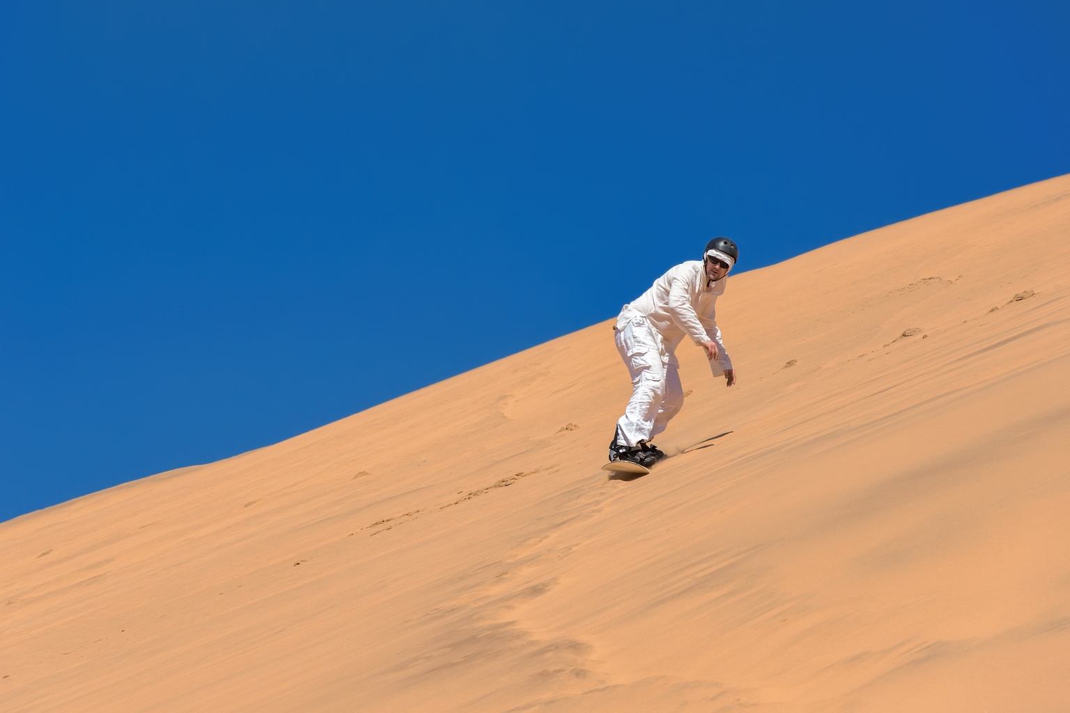 Sandboarding in Namib Desert